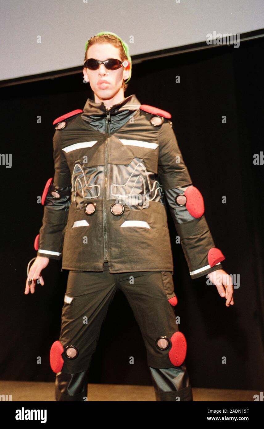Computerised clothing. Fashion model wears comput- erised smart clothes ...