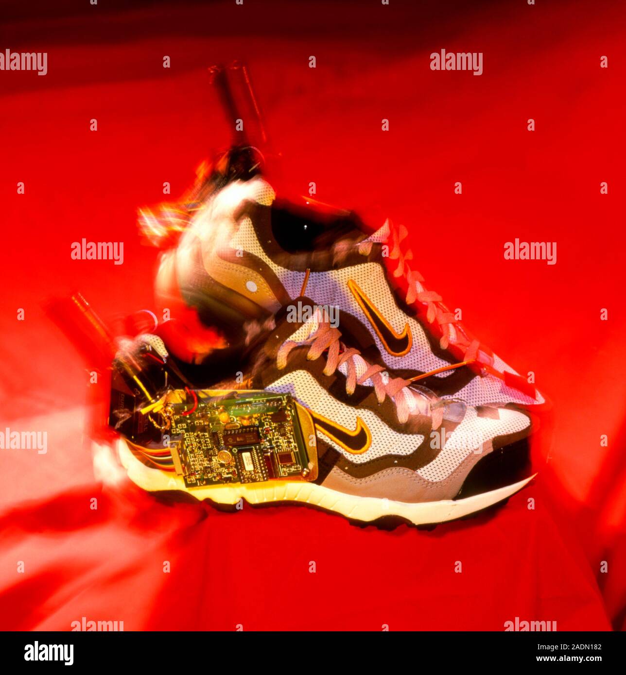 Wearable computing. Pair of prototype motion- sensitive shoes, a type ...