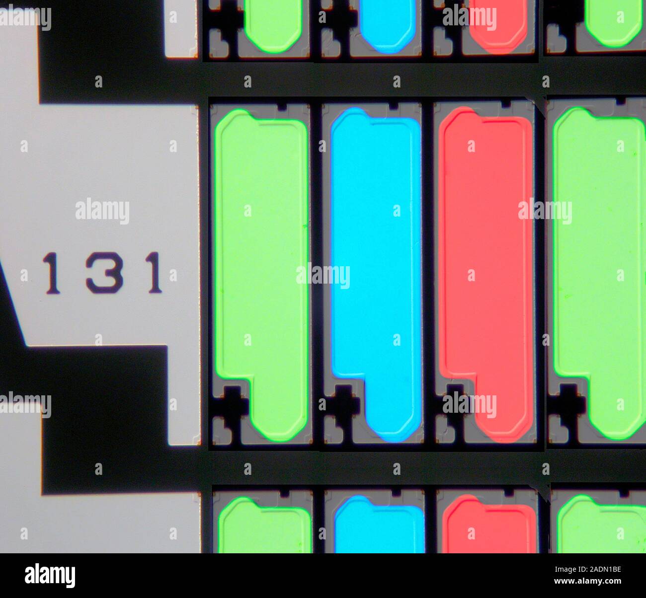 Liquid crystal display grid. Coloured scanning electron micrograph (SEM ...