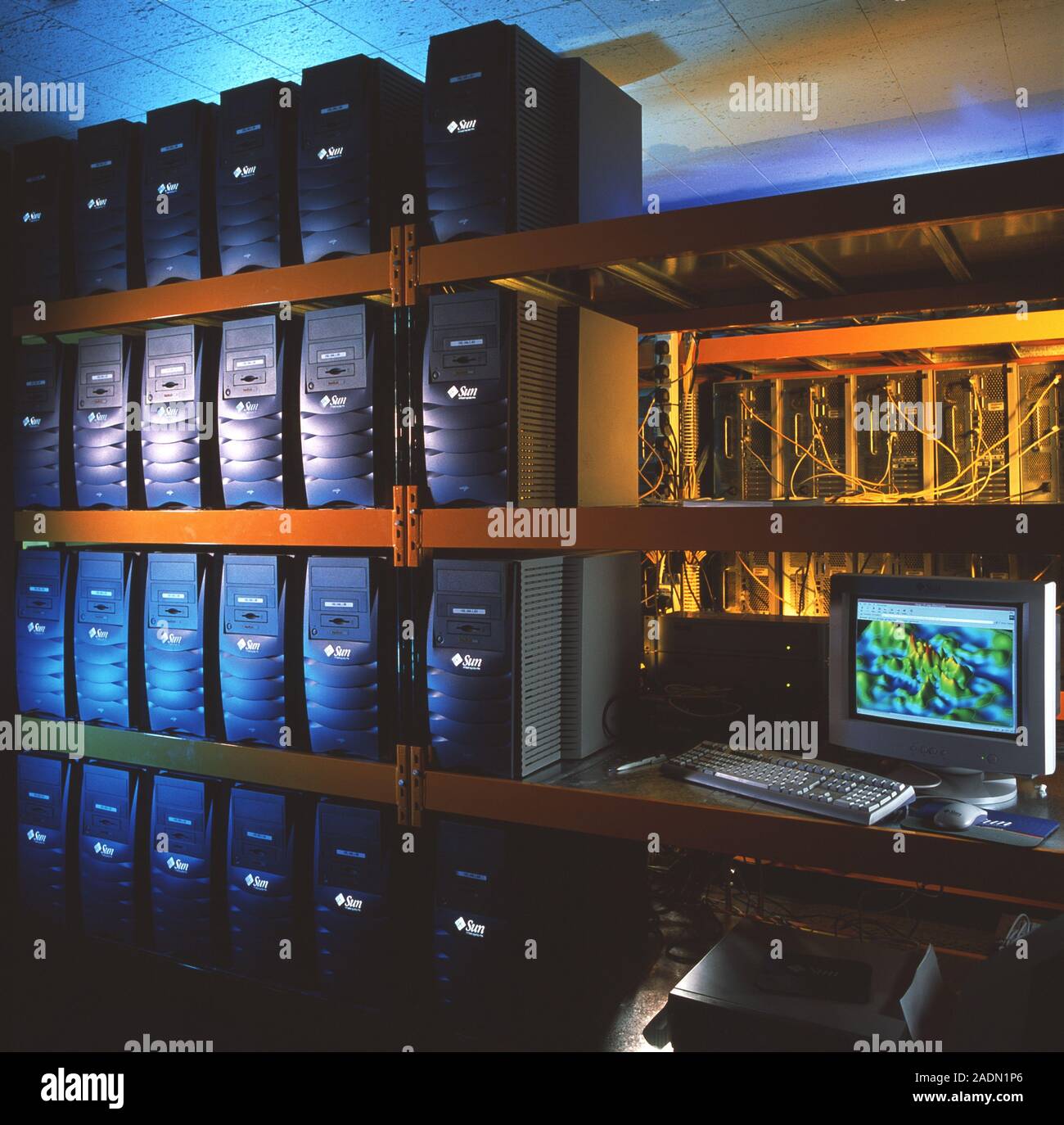 Supercomputer. Main processing units and a monitor of the Cosmology ...