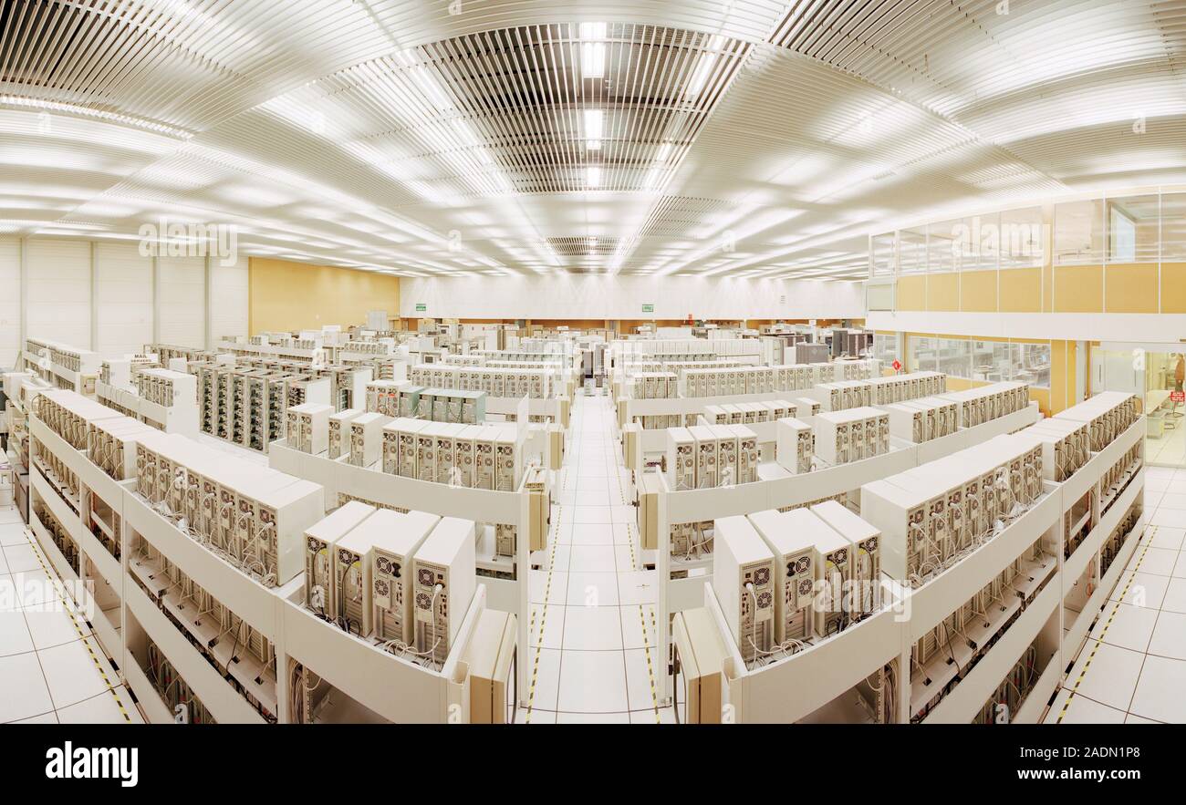 Grid supercomputers. Fish-eye lens view of a room packed with computers ...
