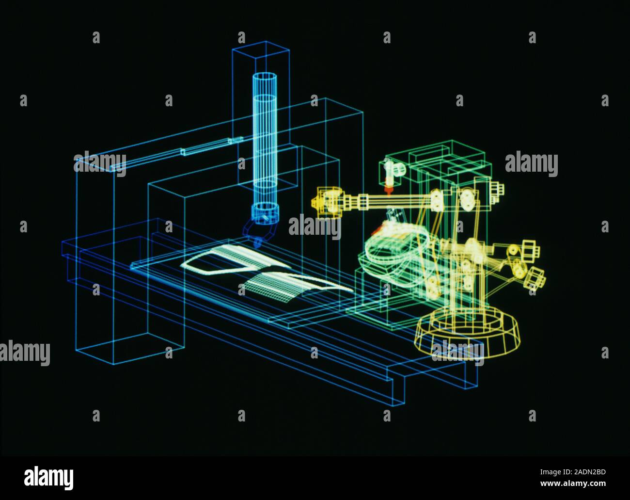 Industrial robot simulation. Computer display showing a simulation of ...