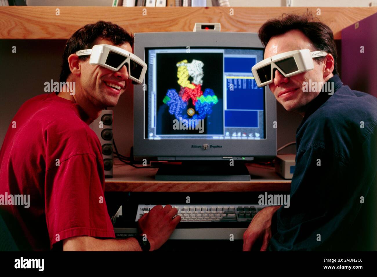 3-D molecular modelling. Two researchers wearing 3-D (3 dimensional ...