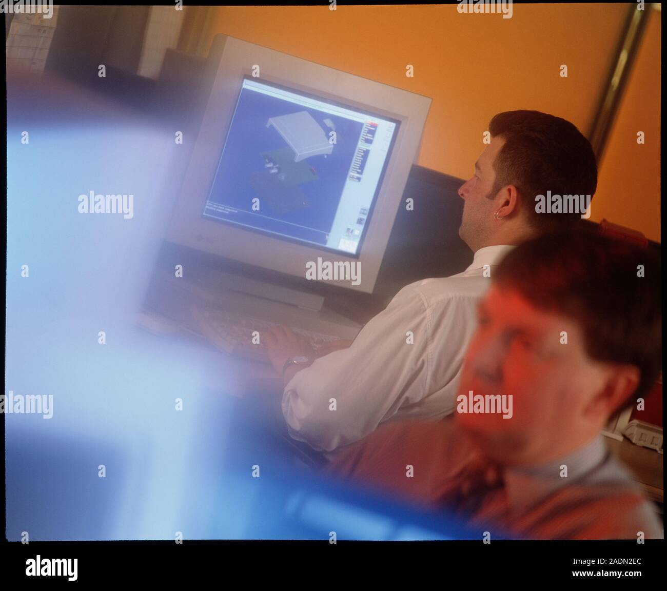 Electronics design. Engineers using computer-aided design (CAD ...