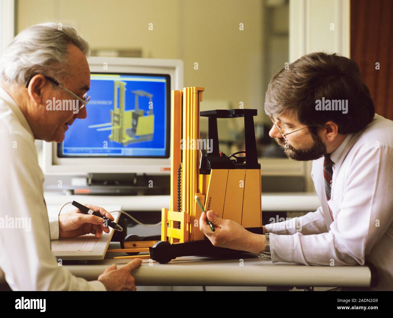 Fork-lift truck design. Designers using a model and computer-aided ...