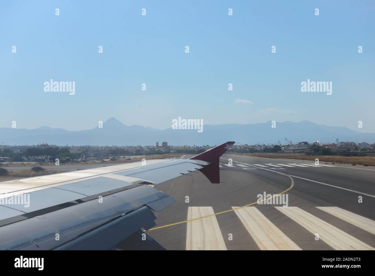 The plane landed at the airport Stock Photo - Alamy