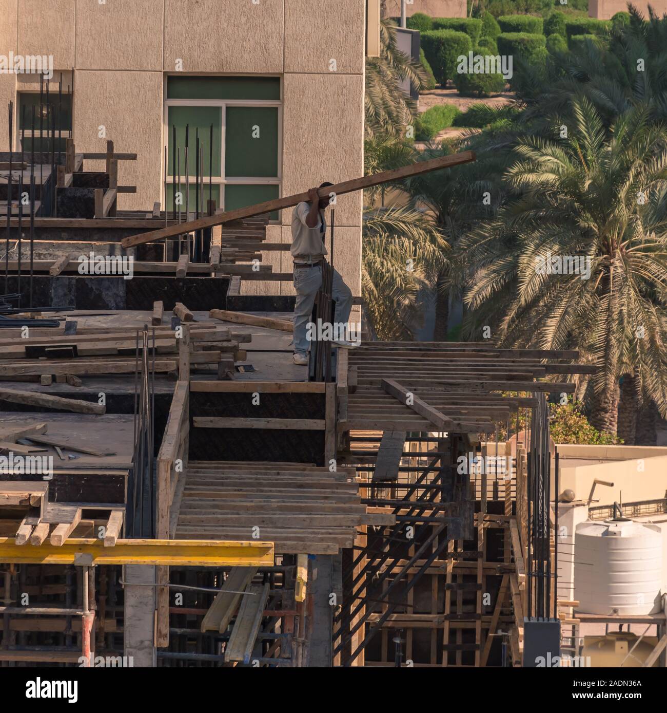 A building under construction in downtown Kuwait City Stock Photo - Alamy