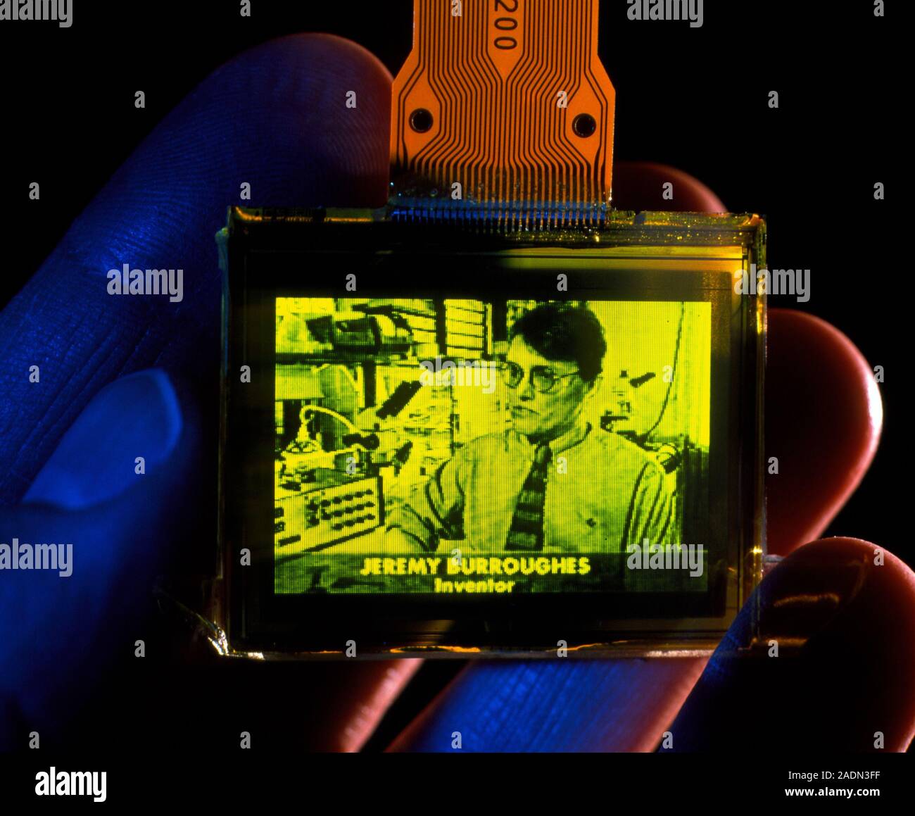 Plastic television screen. View of a hand holding a prototype of a ...
