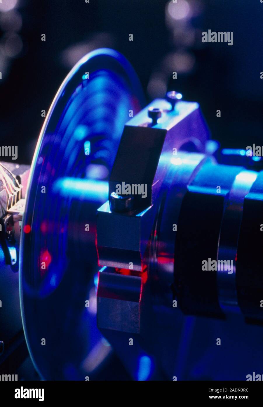 Compact disc manufacture. A compact disc master being 'written' upon by ...