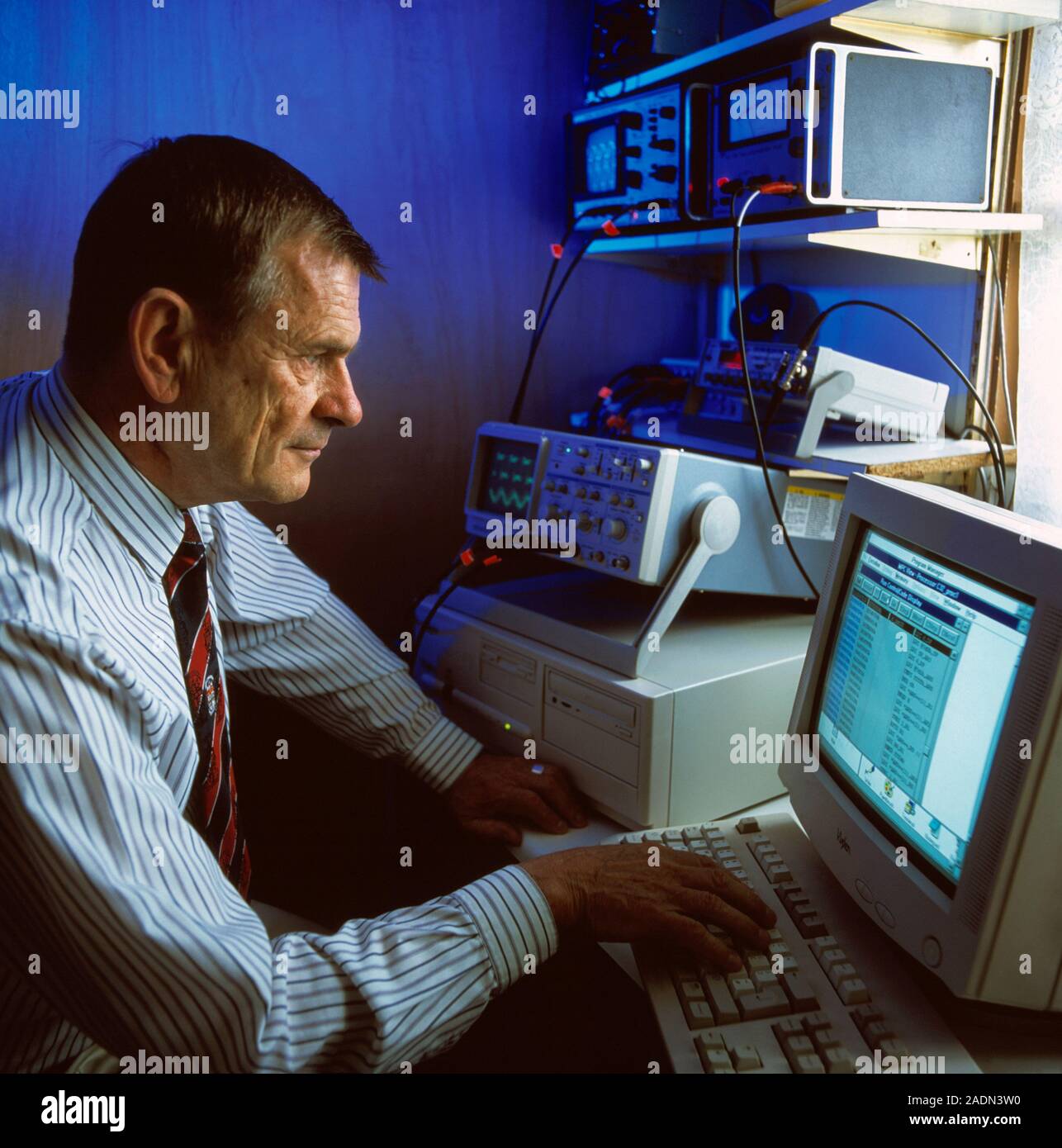 Silence machine. Professor Selwyn Wright adjusting his silence machine ...