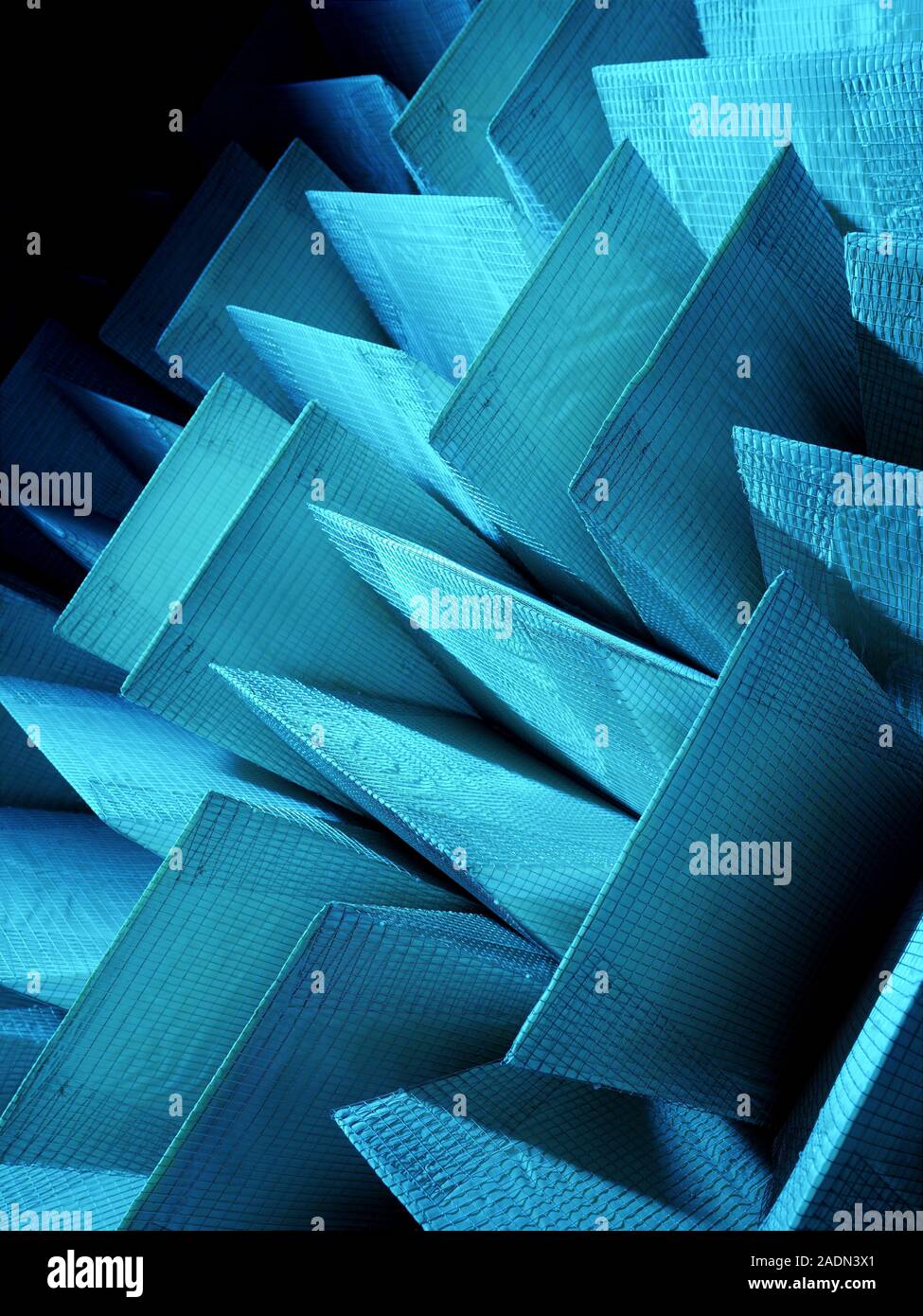Acoustic testing chamber. Tiles on the wall of an anechoic chamber, a ...