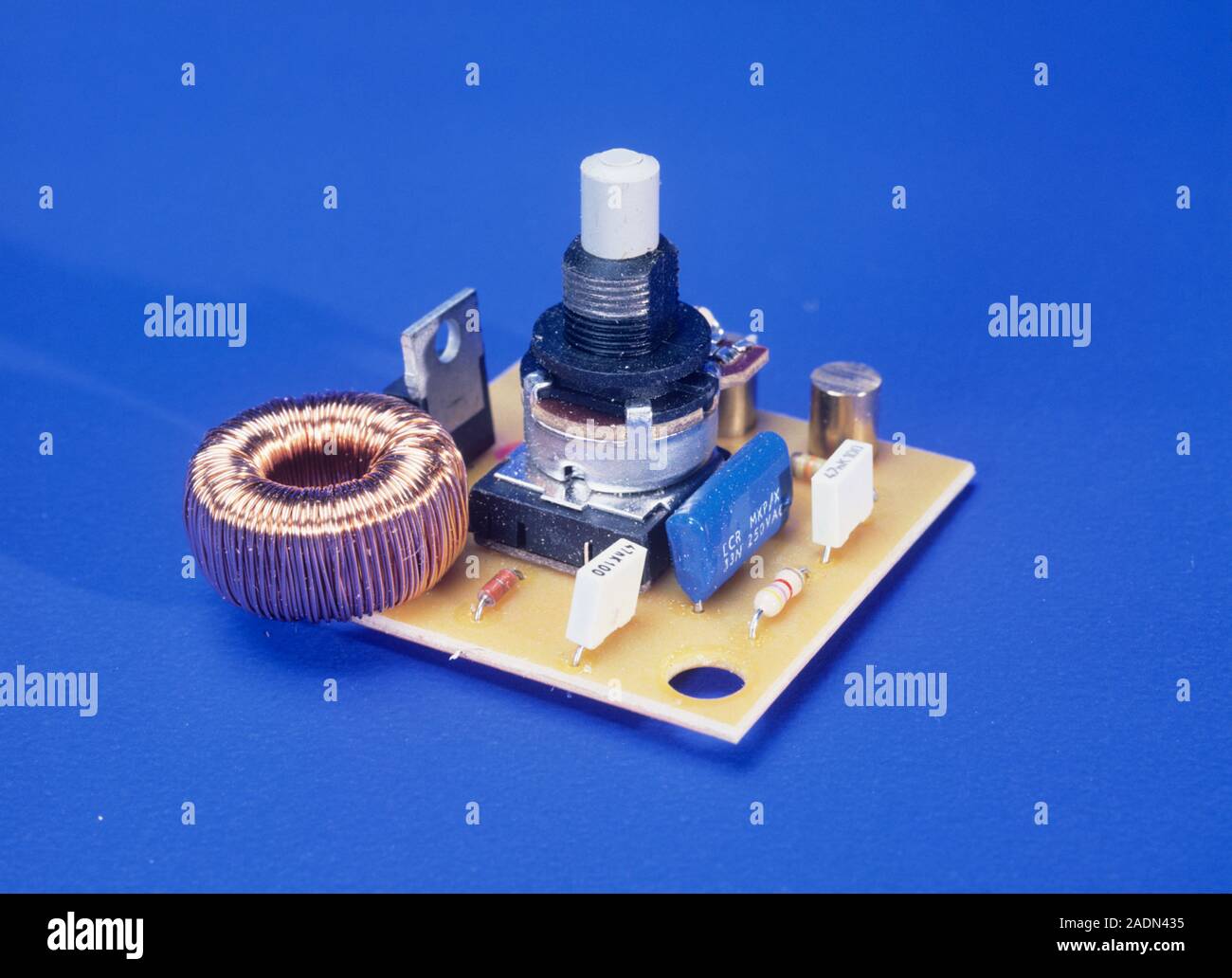 Dimmer switch. This is the inside of the switch. The working components ...
