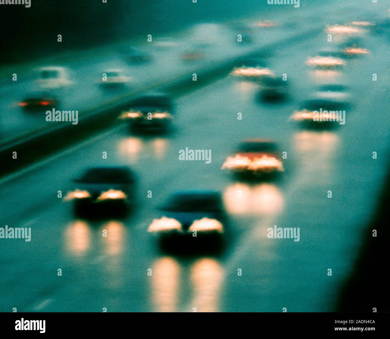 Motorway traffic in the rain. Cars on the M3 motorway in the rain ...