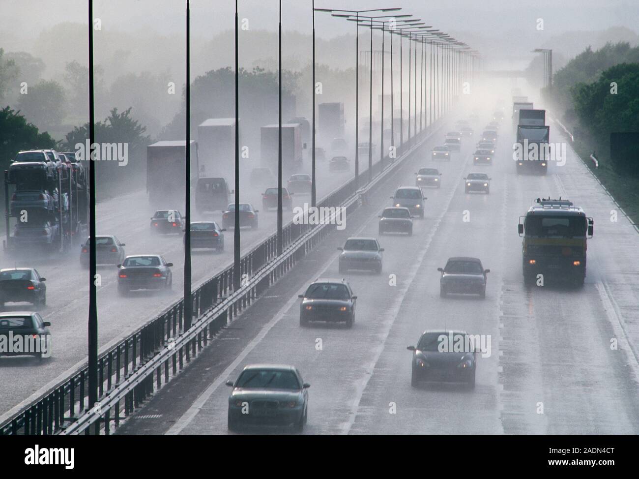 Motorway traffic in the rain Stock Photo - Alamy