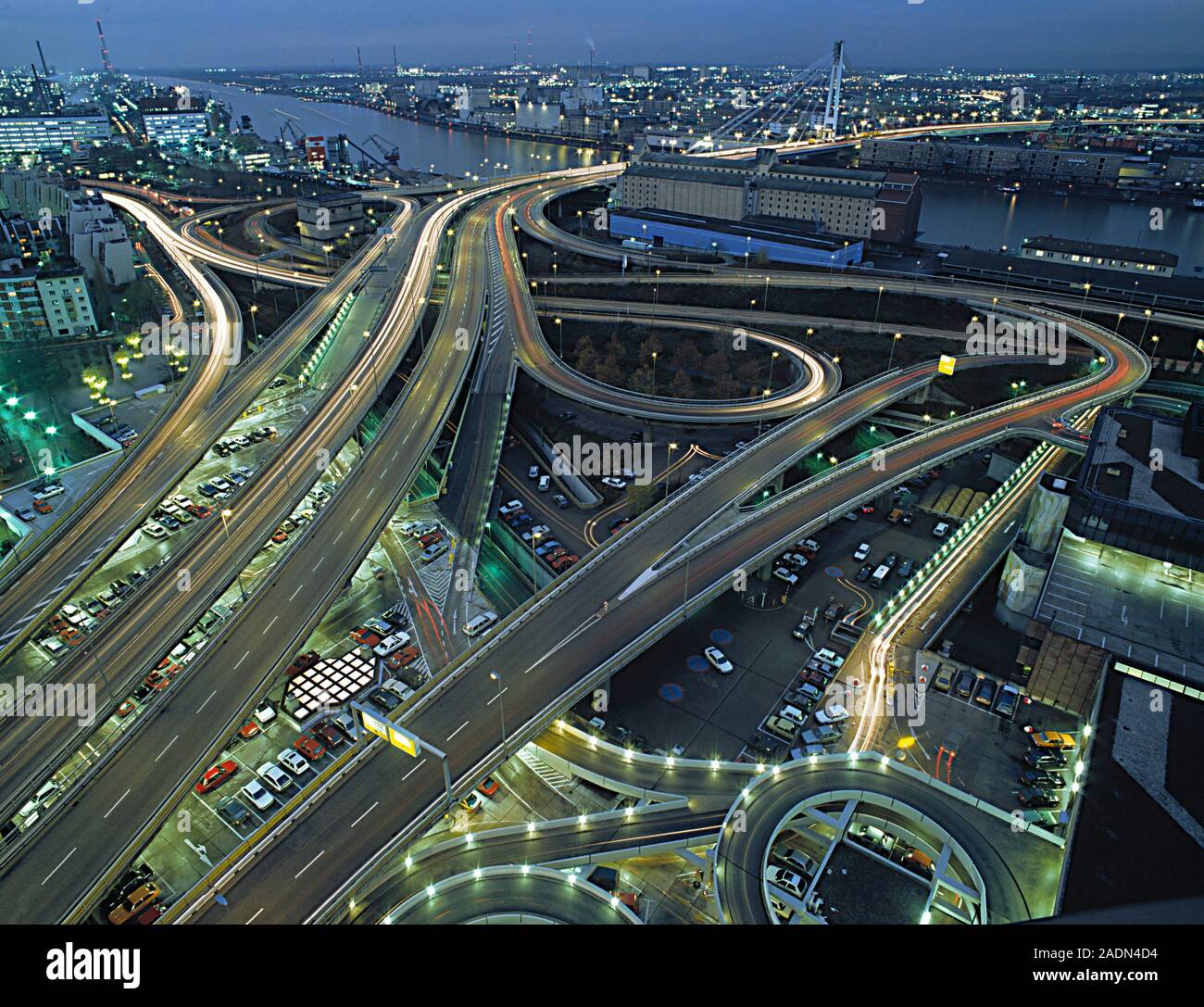 Night-time traffic. Time-exposure image of the trailing lights of ...