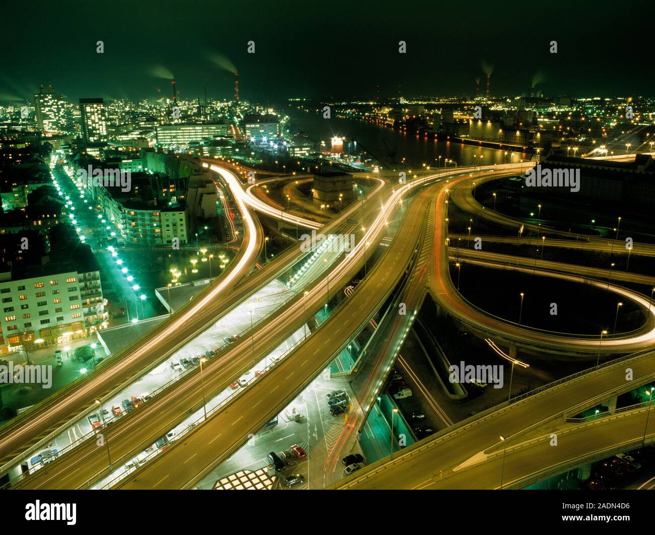 Night-time traffic. Time-exposure image of the trailing lights of ...