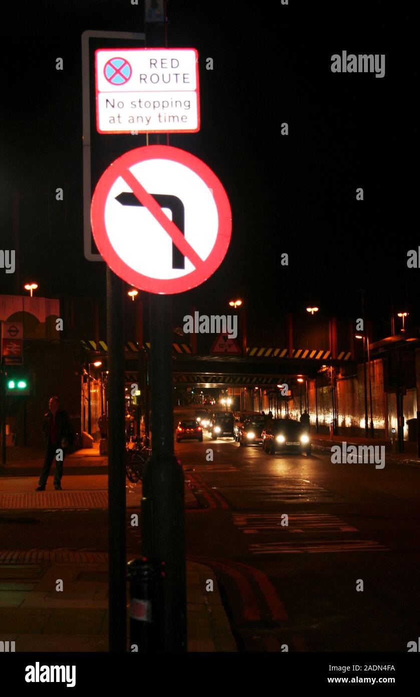 Road signs at night. The signs are made out of a highly reflective ...