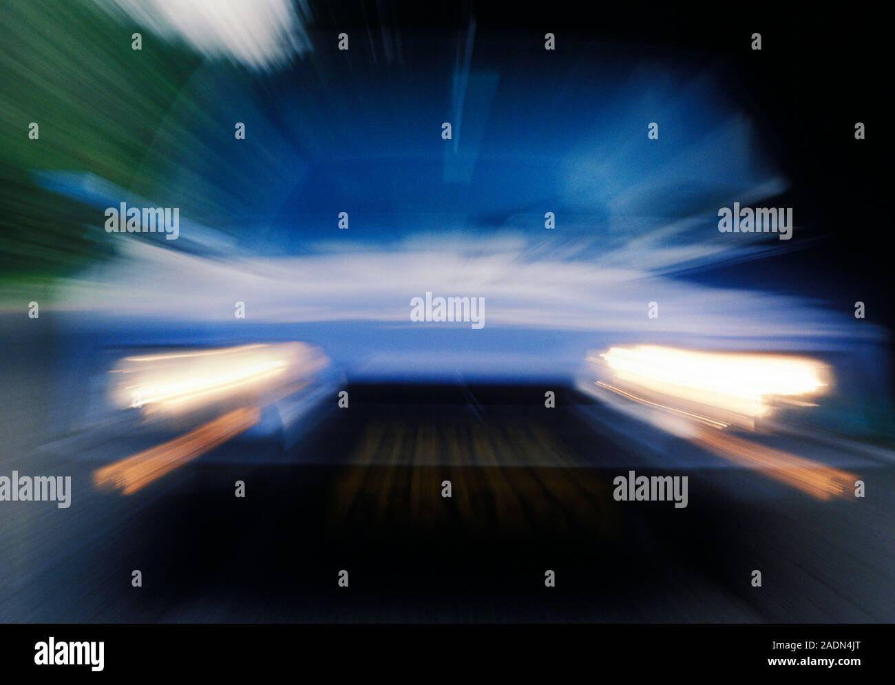 Headlights of a fast moving car Stock Photo - Alamy