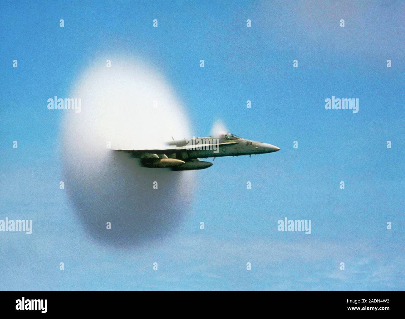Sonic boom aircraft. Cloud forming behind an aircraft as it breaks the ...