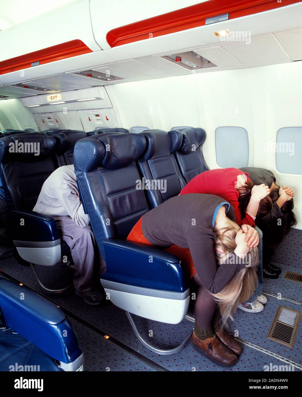 Brace position. Passengers adopting the brace position for crash ...