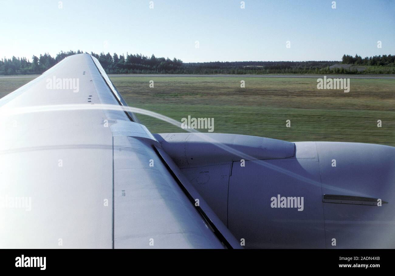 Aircraft wing vortices. A spiral of air flowing over the upper surface ...