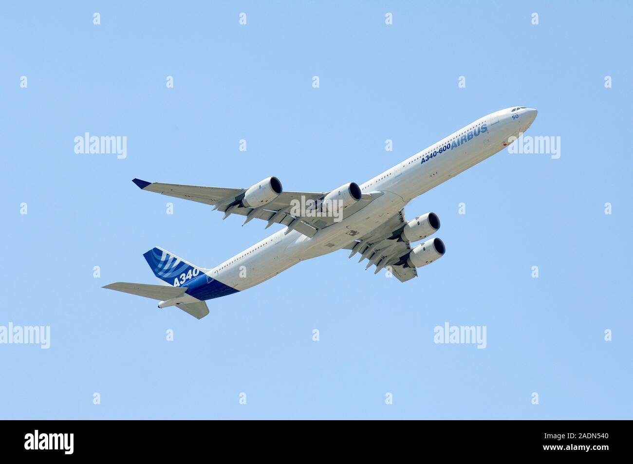 Airbus A340 aircraft in flight. This is a long- range four-engined ...