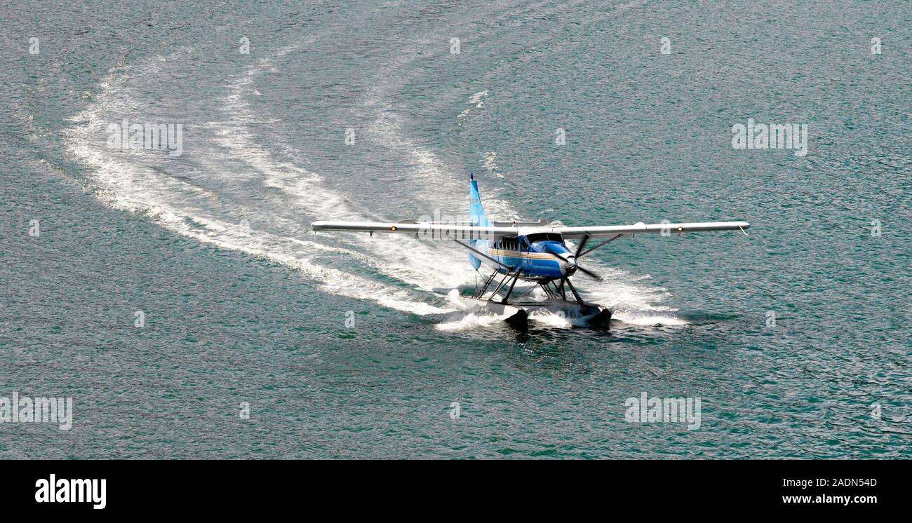 Seaplane landing on water. Photographed in Alaska, USA Stock Photo - Alamy