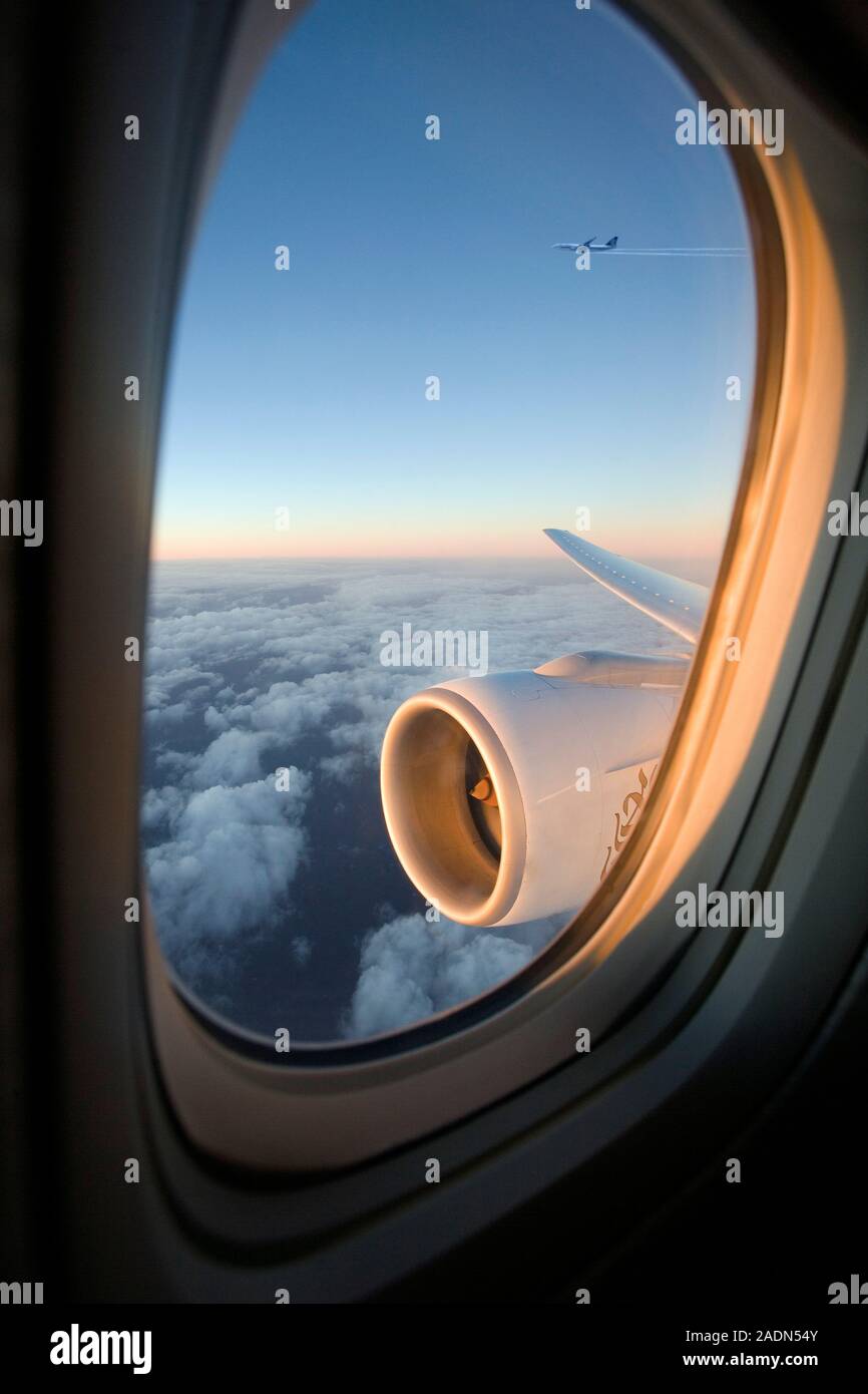 Aeroplane window. View through the window of an airborne aeroplane ...