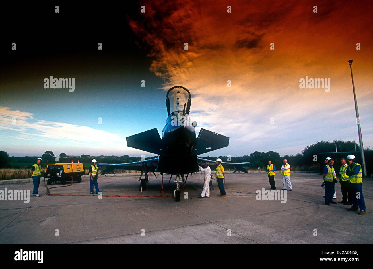 Typhoon fighter plane and a ground crew preparing for a test flight ...
