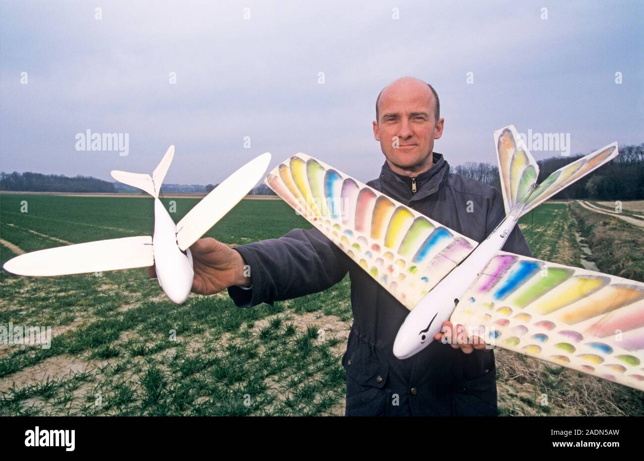 Ornithopter flapping wing aircraft. French inventor Albert Kempf holding miniature flapping wing ...