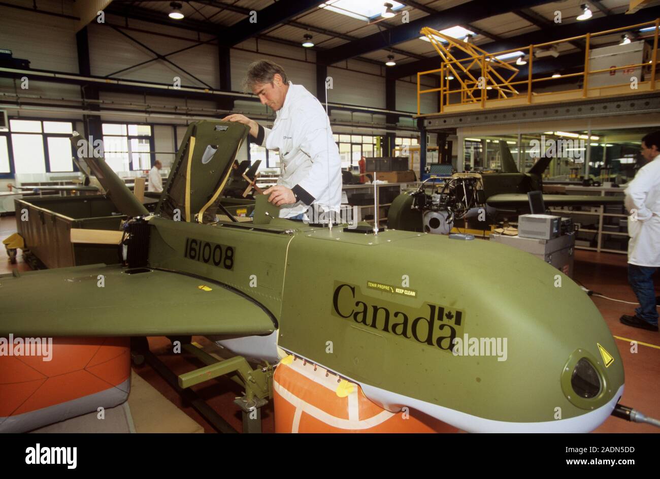 Sperwer UAV manufacture. Engineer looking through the access hatch of a ...