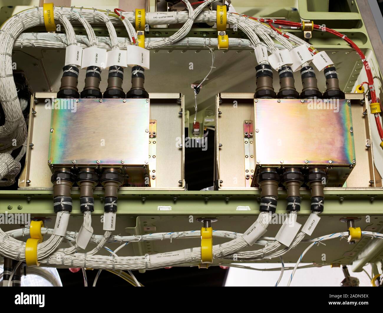 Aircraft wiring. View of the wires of a communications module inside a ...
