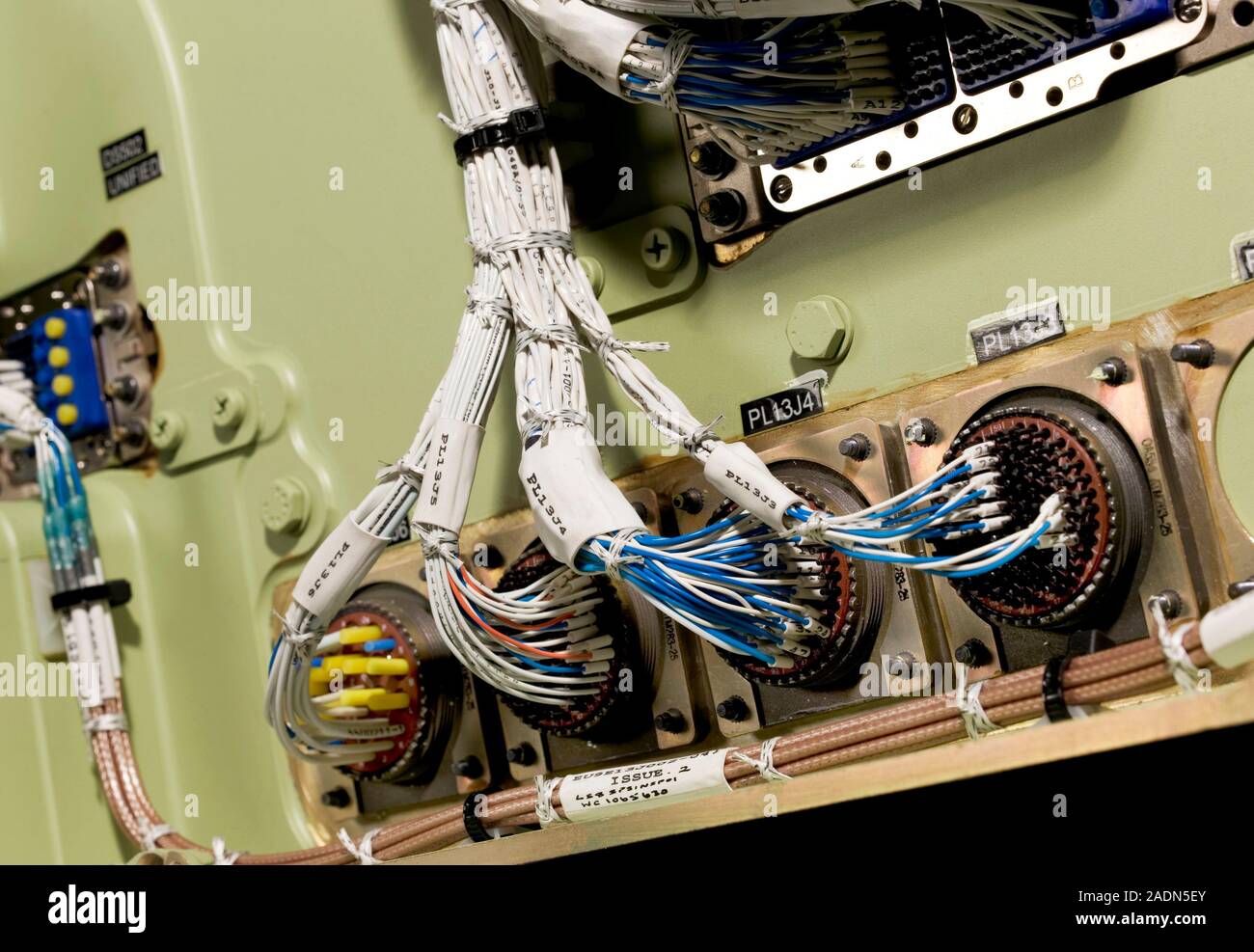 Aircraft wiring. View of the back of the dials and switches on a ...