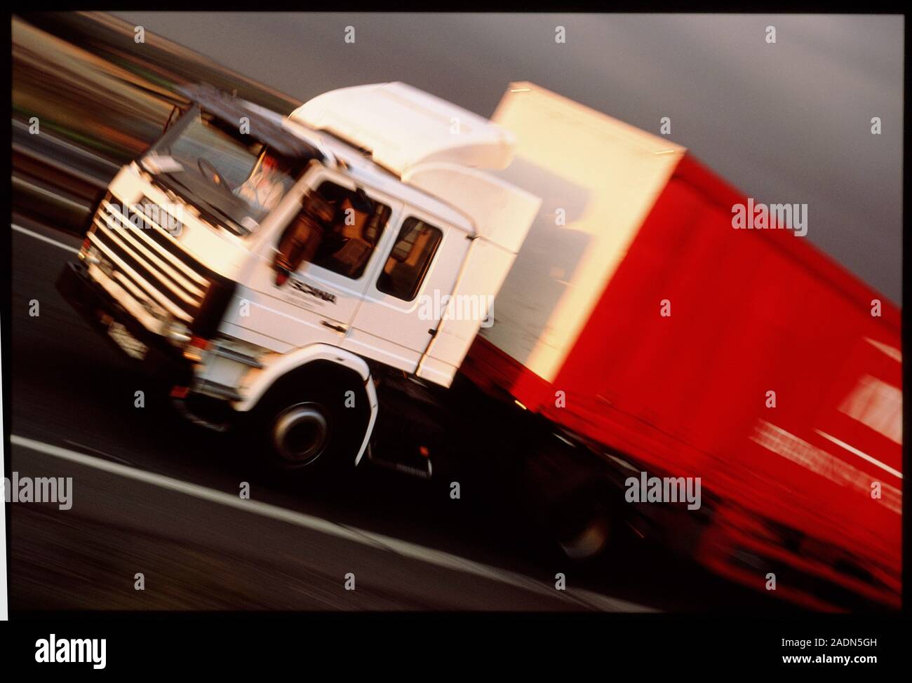 Lorry. Time-exposure image of an articulated lorry. Heavy goods ...