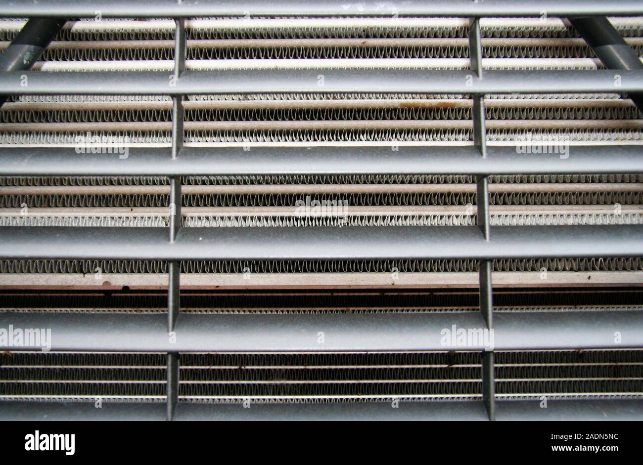 Car radiator grille on the front of a four wheel drive vehicle. Car ...