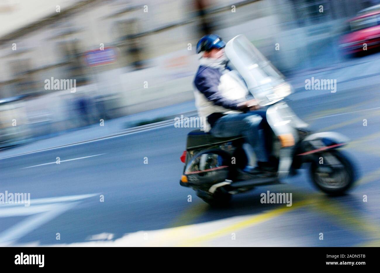 Riding a moped. Photographed in Granada, Spain Stock Photo - Alamy