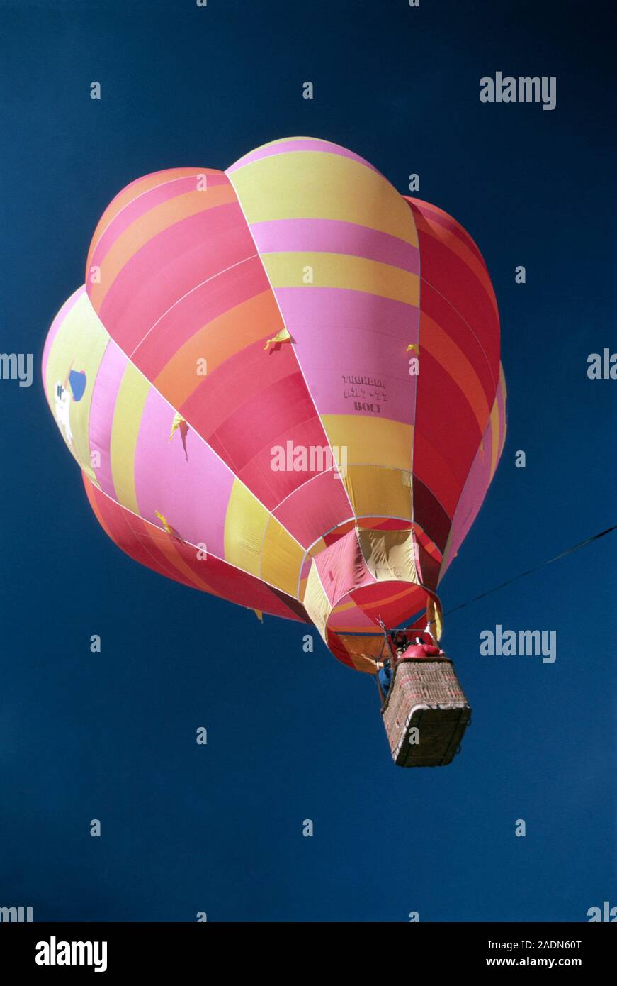 Hot air balloon descending Stock Photo - Alamy