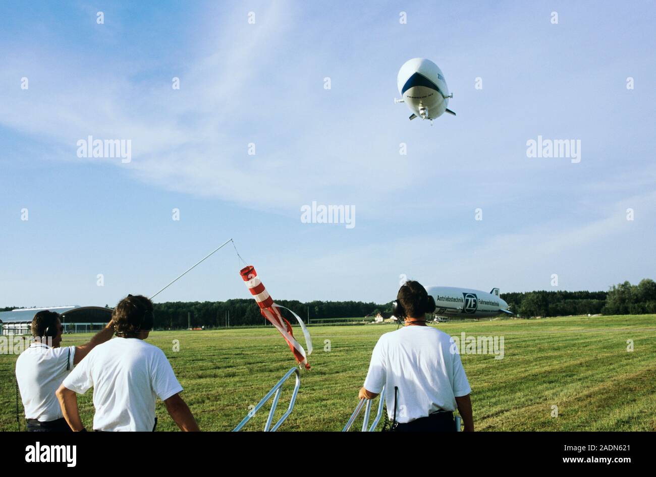 Zeppelin NT, a modern airship. Technicians watch the Zeppelin's ...