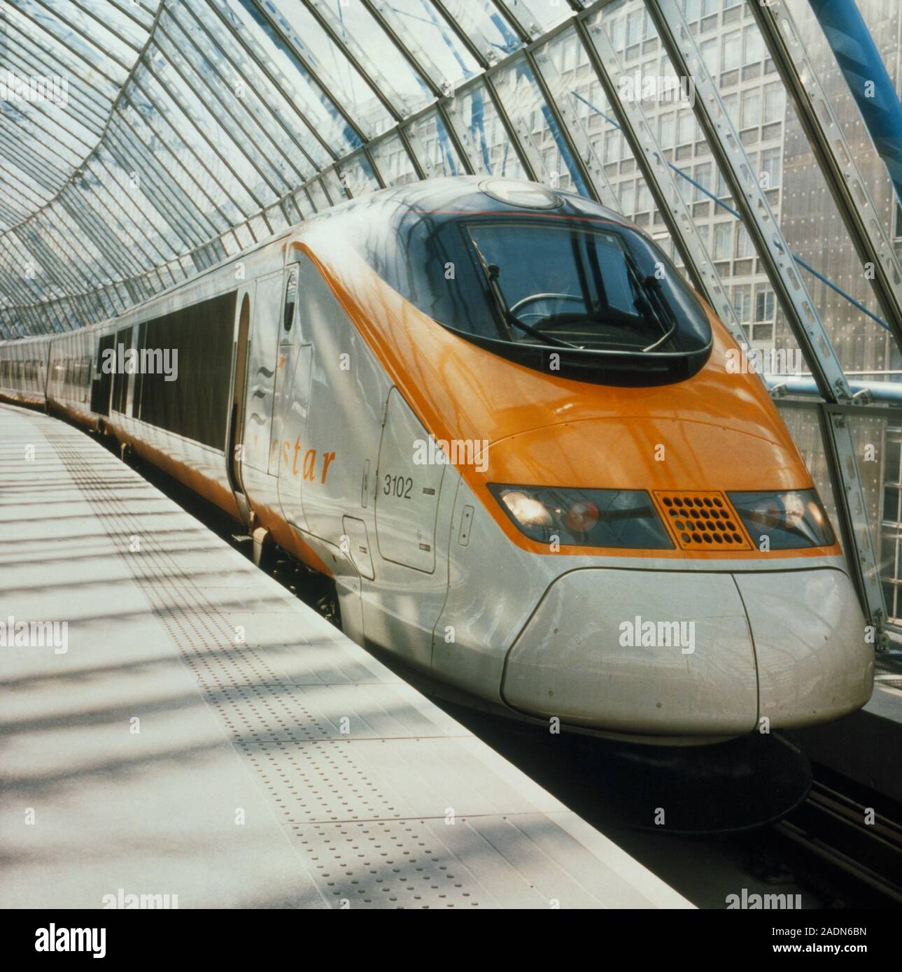Channel Tunnel train at a station. The Channel Tunnel provides a rail ...