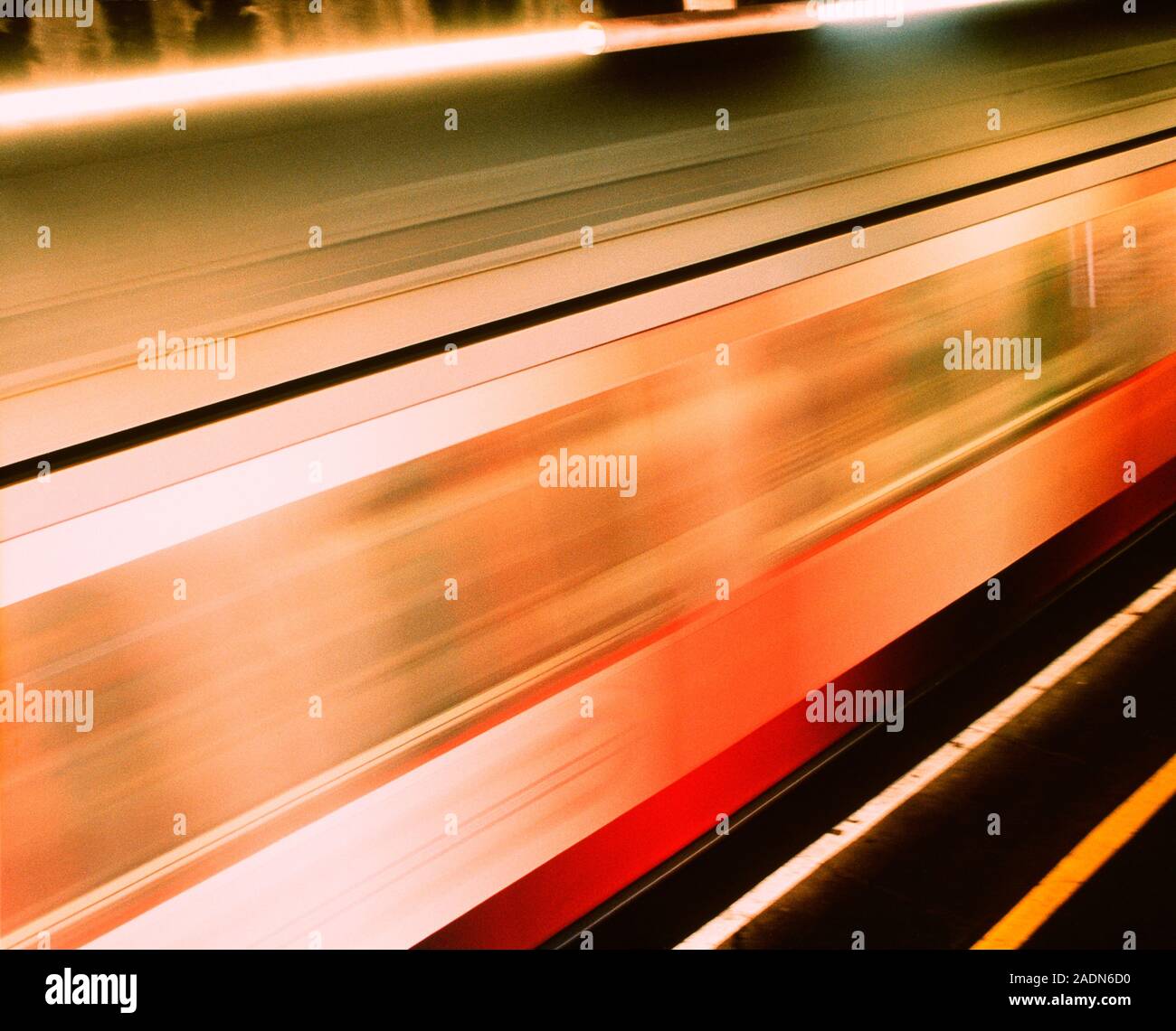 Moving tube train. Time-exposure image of a moving tube train at Baker ...