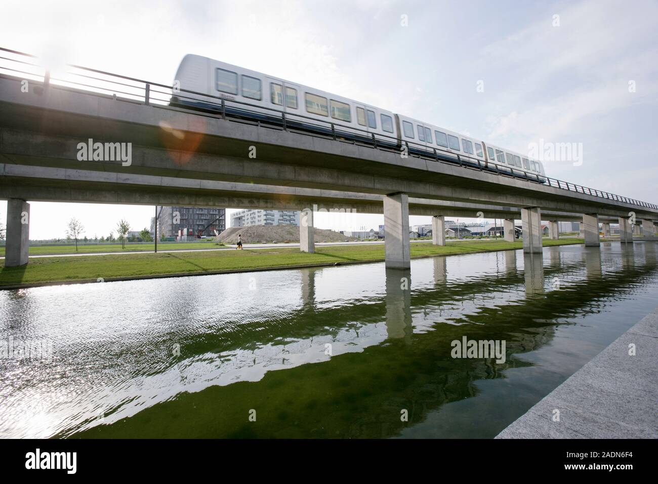 Monorail train travelling over water. This train is automated ...