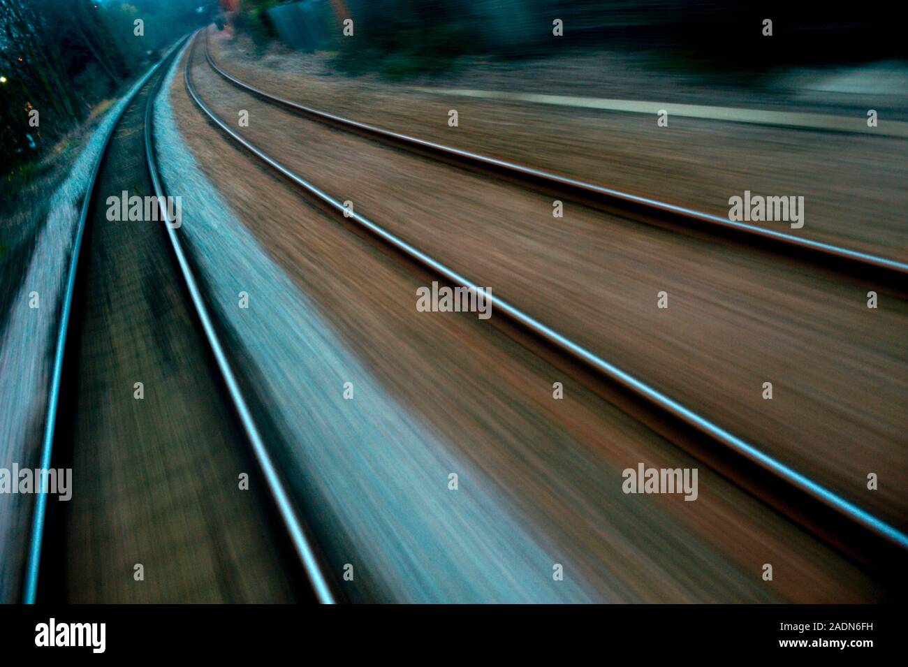 Railway tracks. Photographed from a moving train Stock Photo - Alamy