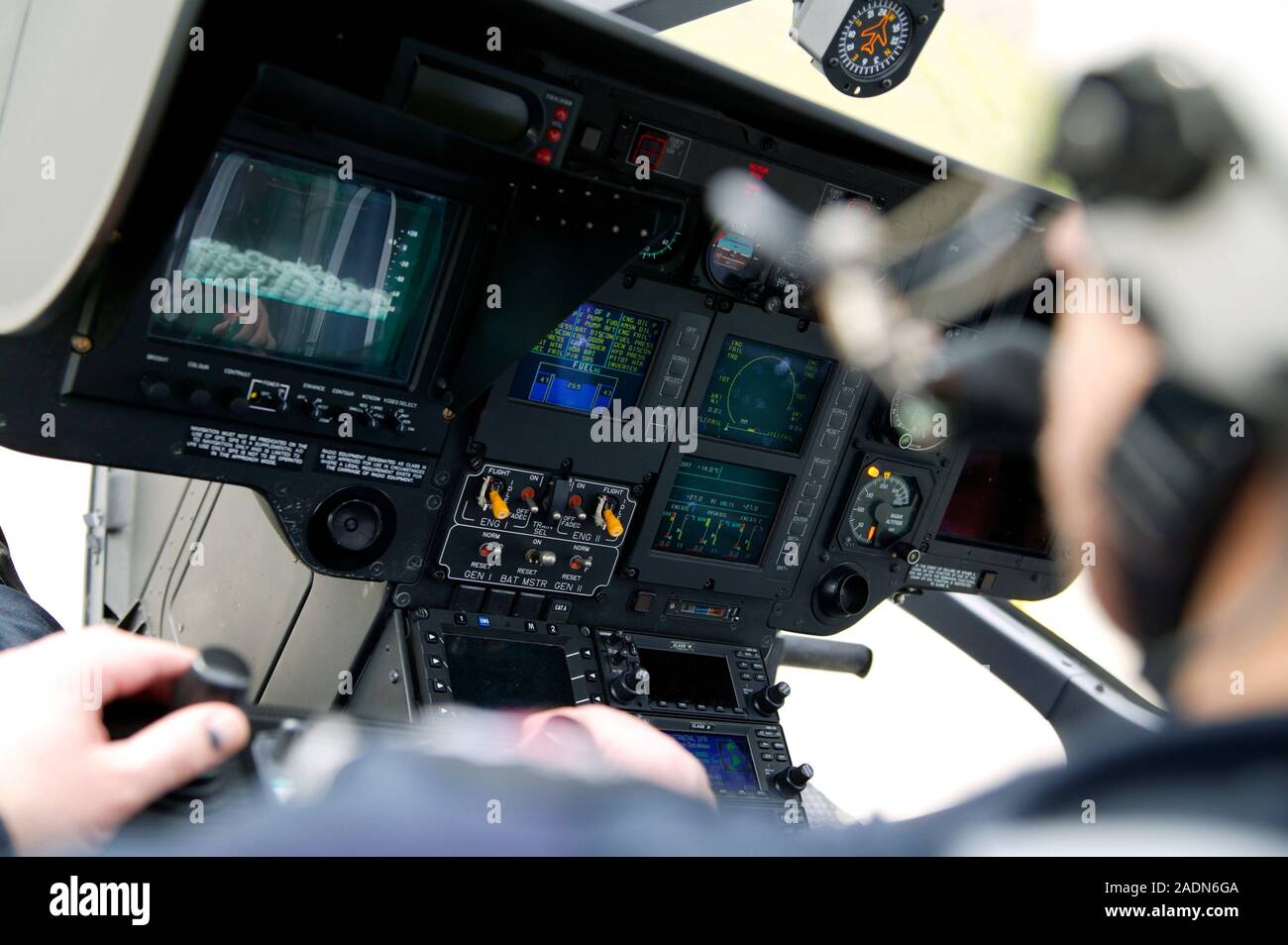 Thermal imaging camera display screen (upper left) inside a helicopter ...