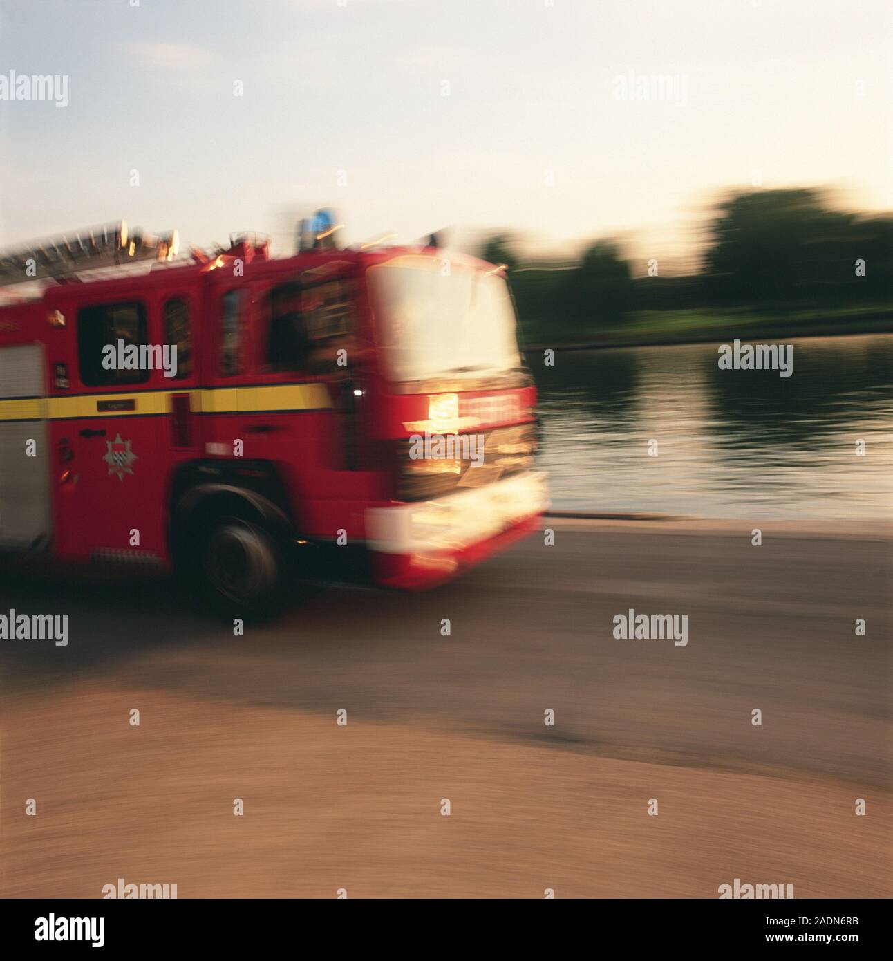 Fire engine. Time exposure image of a fire engine being driven to the ...