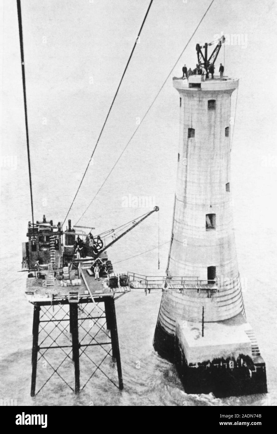 Beachy Head Lighthouse. Fitting of the last masonry stone on the Beachy ...