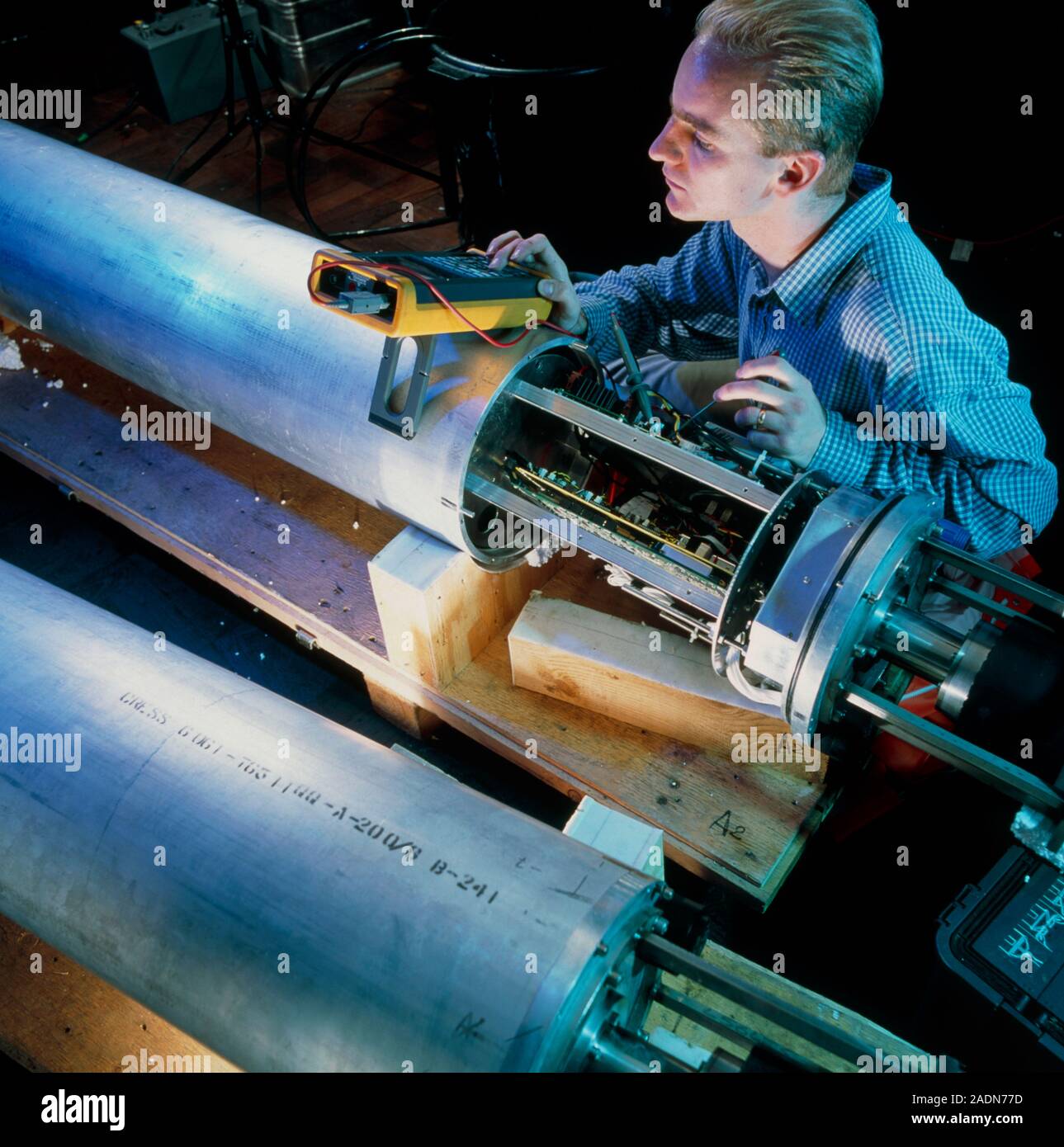 Submarine communications system. Engineer testing the electronic ...