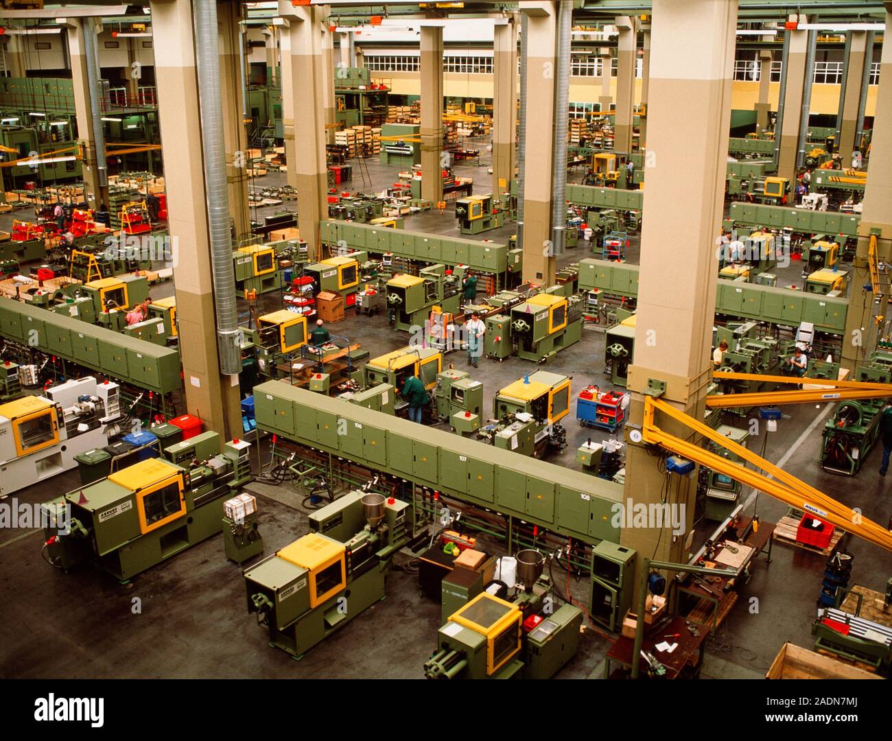 Factory assembly of plastic injection moulding machines Stock Photo - Alamy