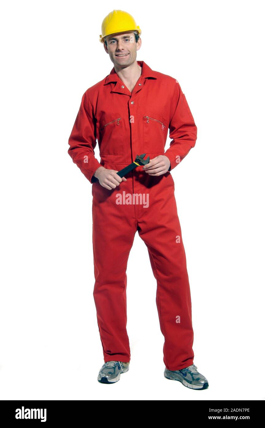 Engineer holding an adjustable spanner Stock Photo - Alamy