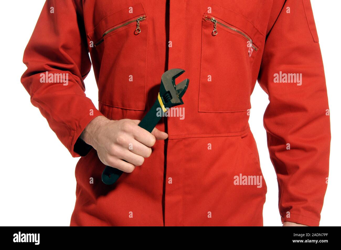 Engineer holding an adjustable spanner Stock Photo - Alamy