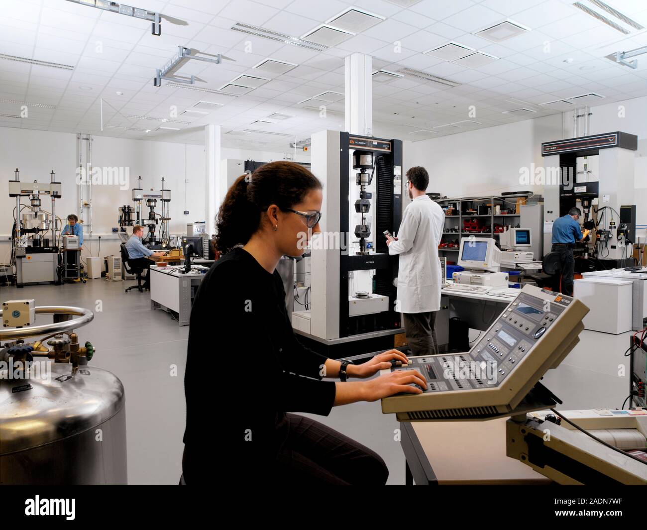 Mechanical testing laboratory. Physicists working on various projects ...